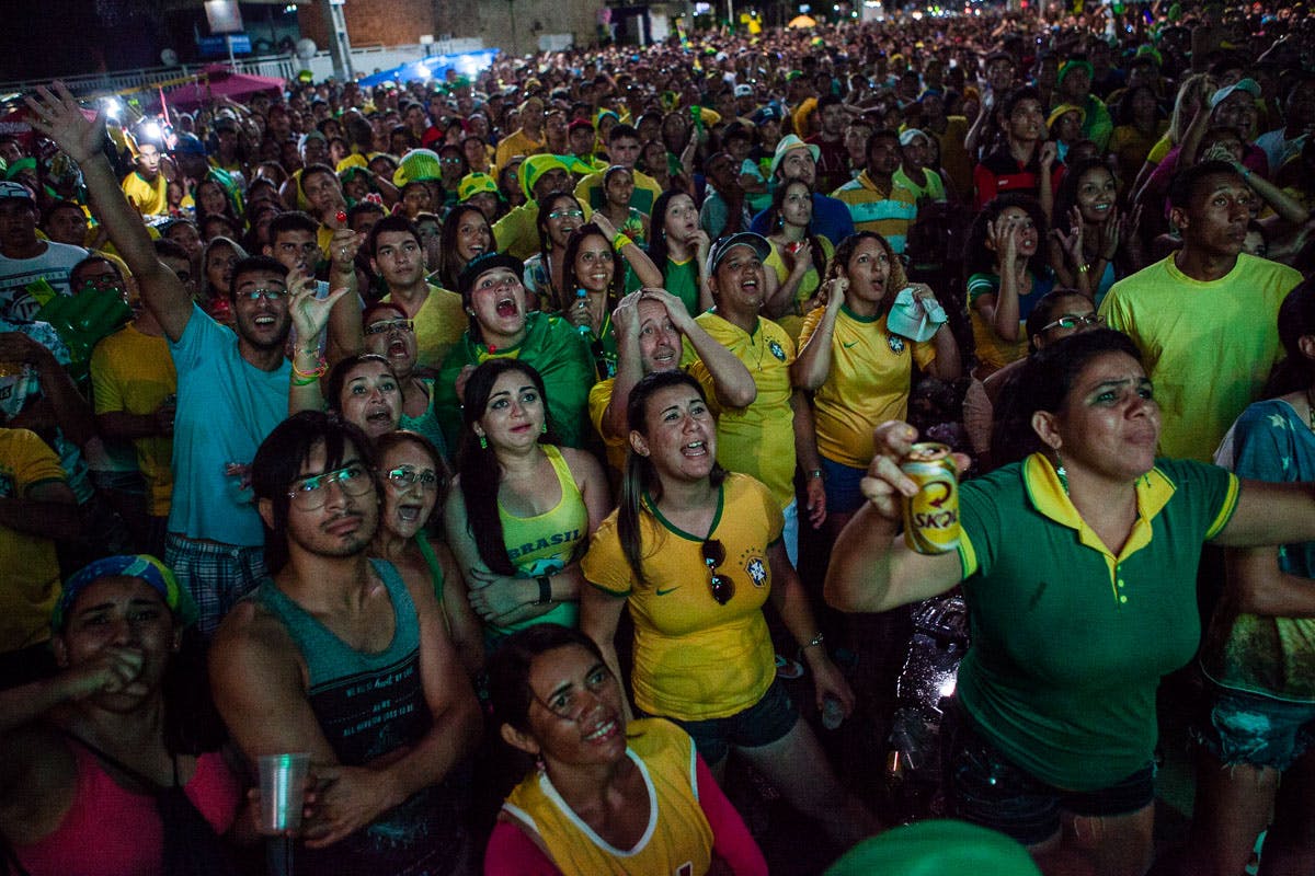 World Cup 2014: Photos of Brazil Fans Celebrating Win in Fortaleza ...